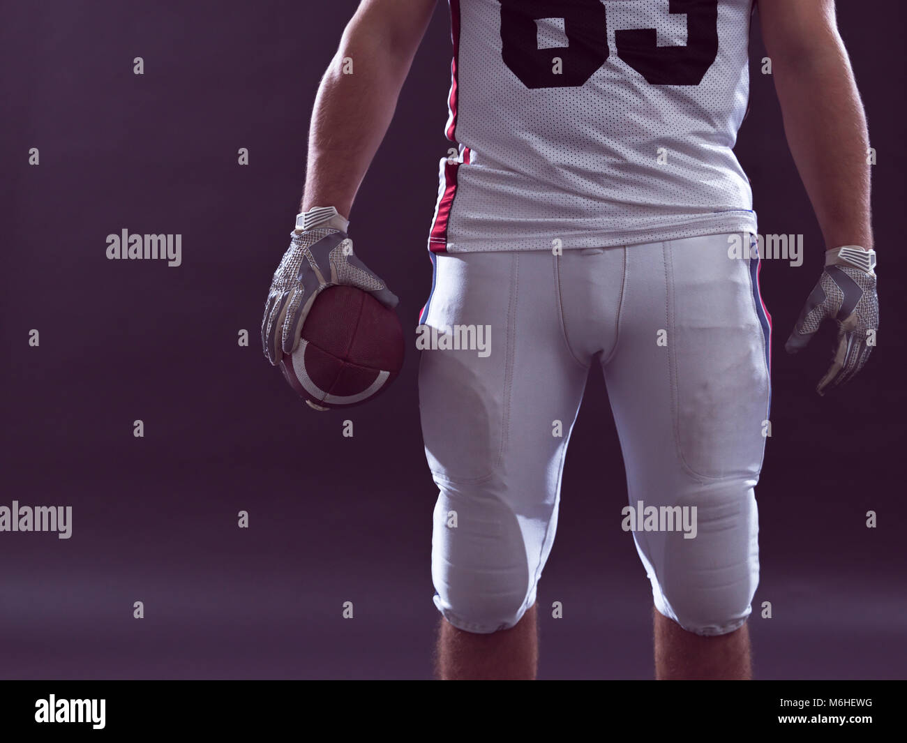 Closeup Portrait of a strong muscular American Football Player isolated ...