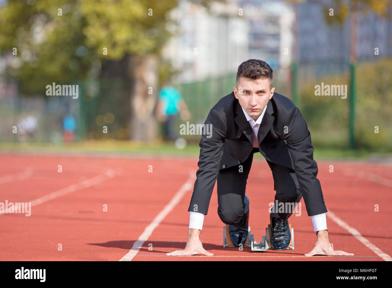Indian man running in suit hi-res stock photography and images - Alamy