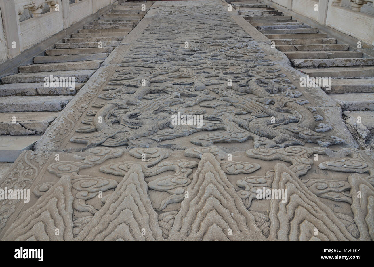 A single marble slab sculptured with dragon and phoenix motifs Stock ...