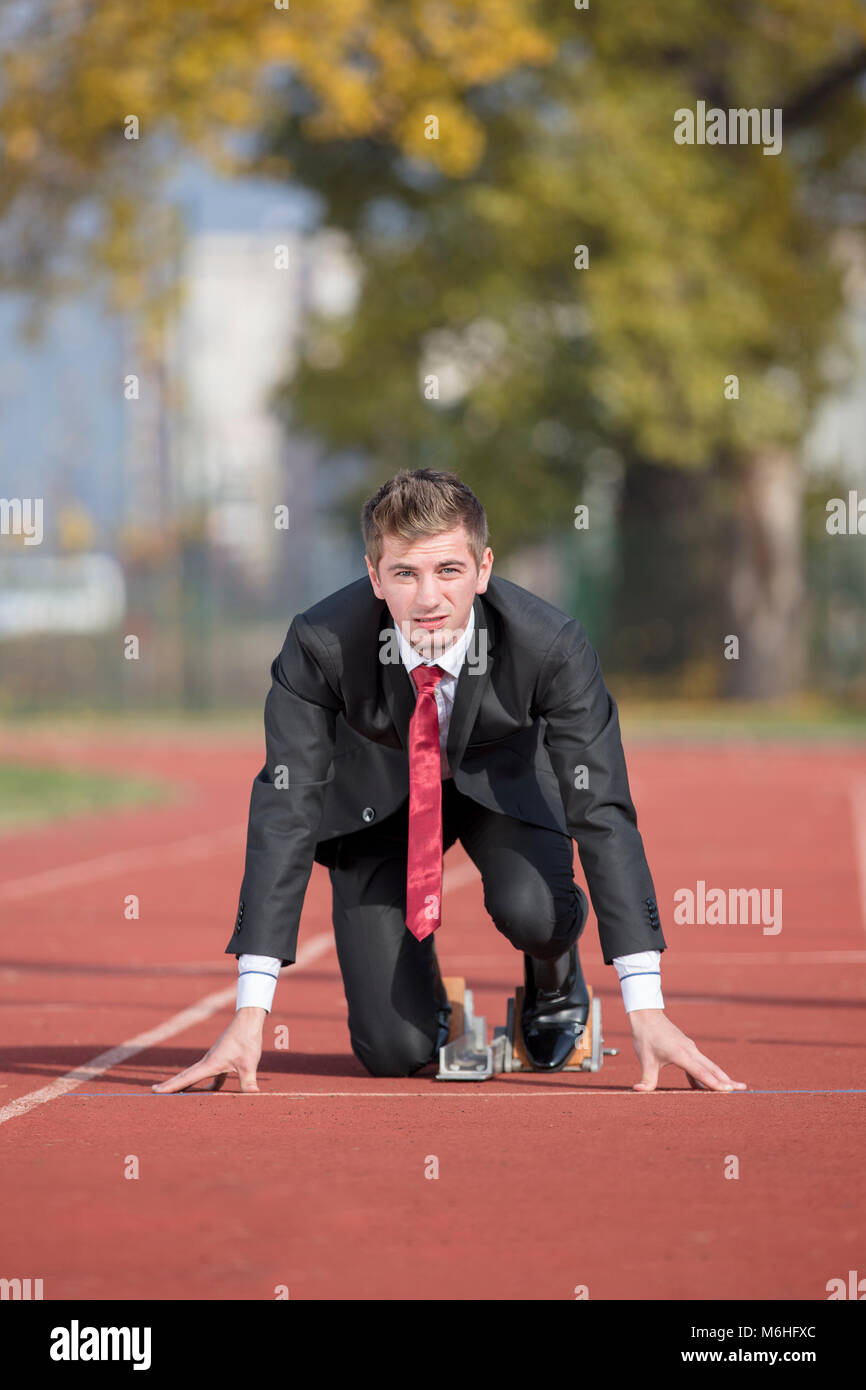 Indian man running in suit hi-res stock photography and images - Alamy