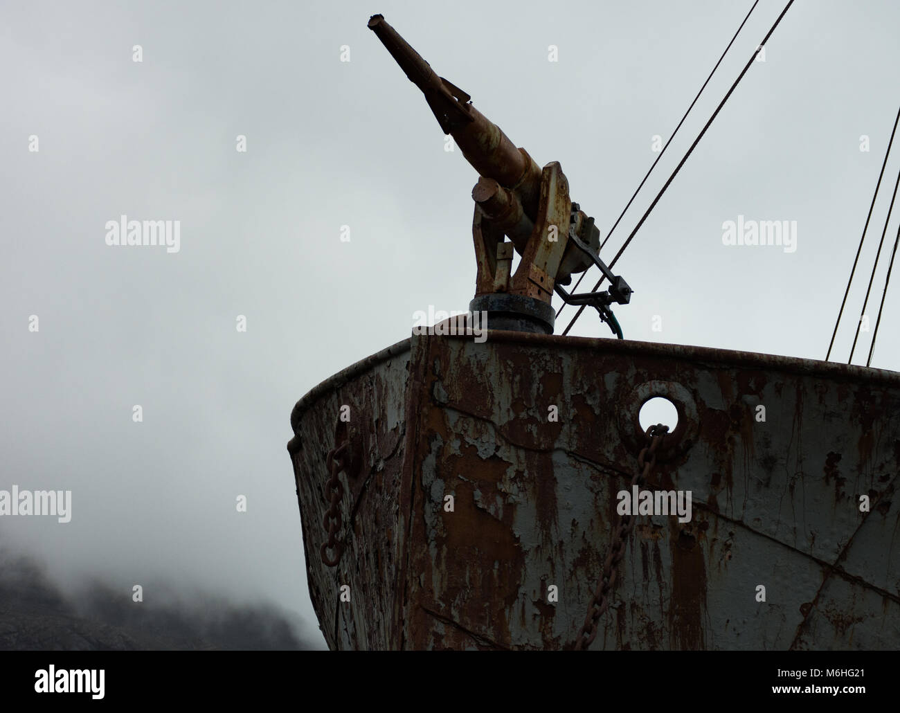 Close up of a harpoon on a rusted, grounded whaling boat in Grytviken ...