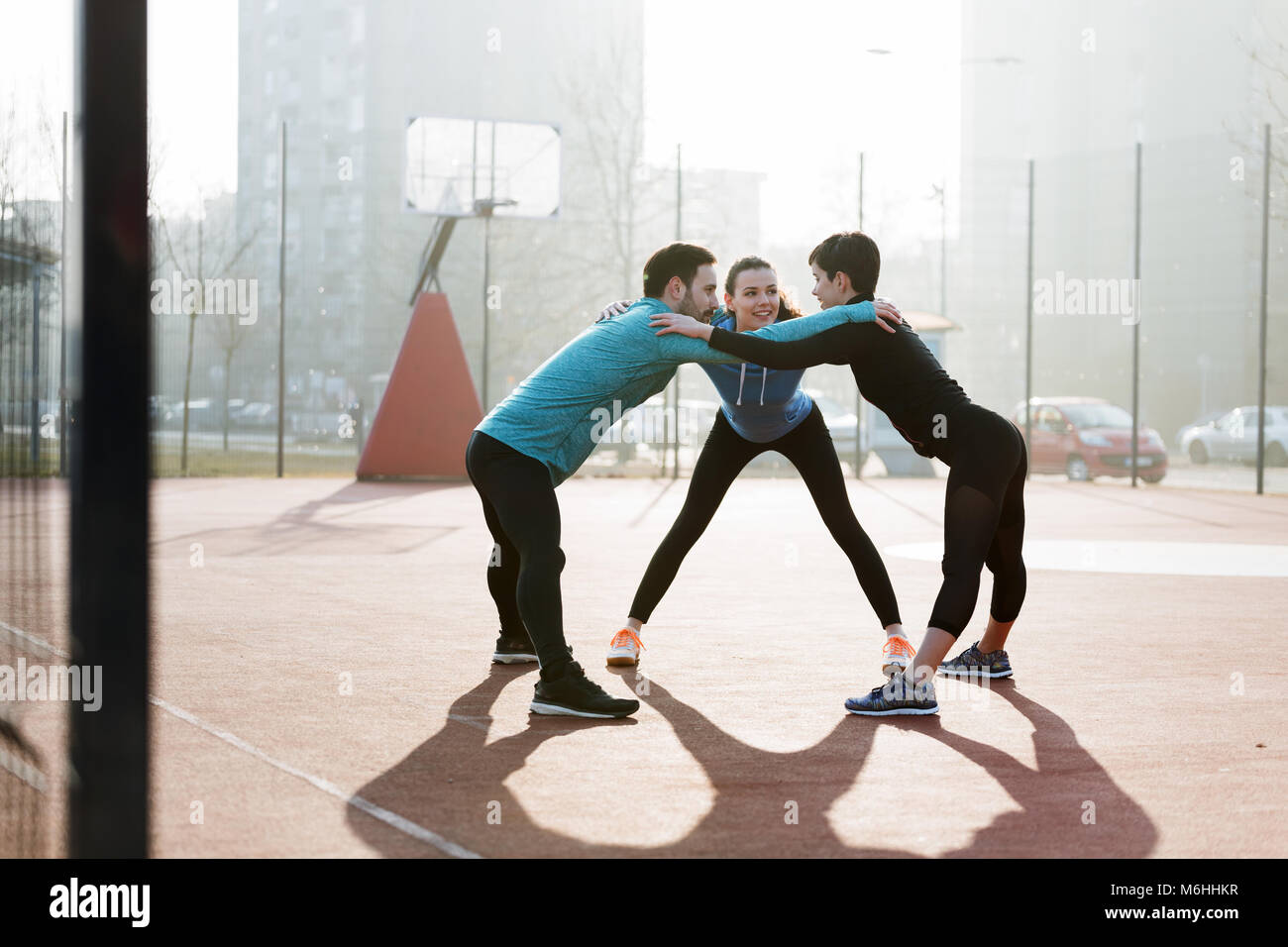 Group of healthy sporty determined friends fitness training toge Stock ...