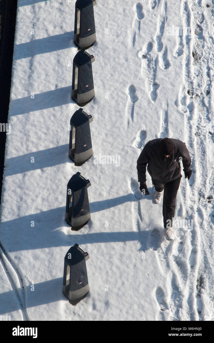 Walking through the snow in Central London, looking down from above ...