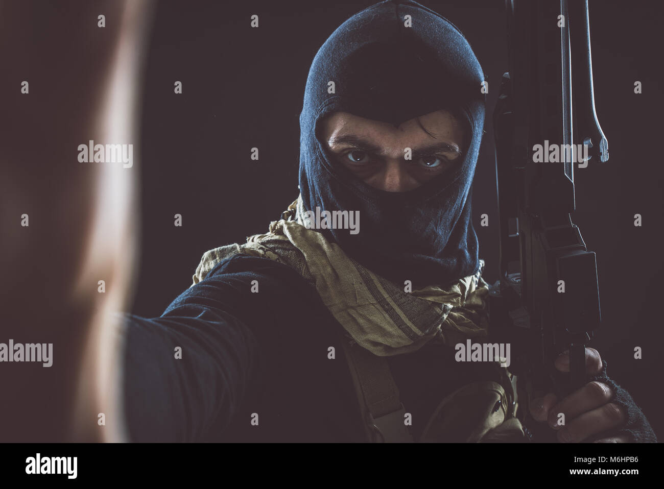 Terrorist criminal portrait Stock Photo - Alamy