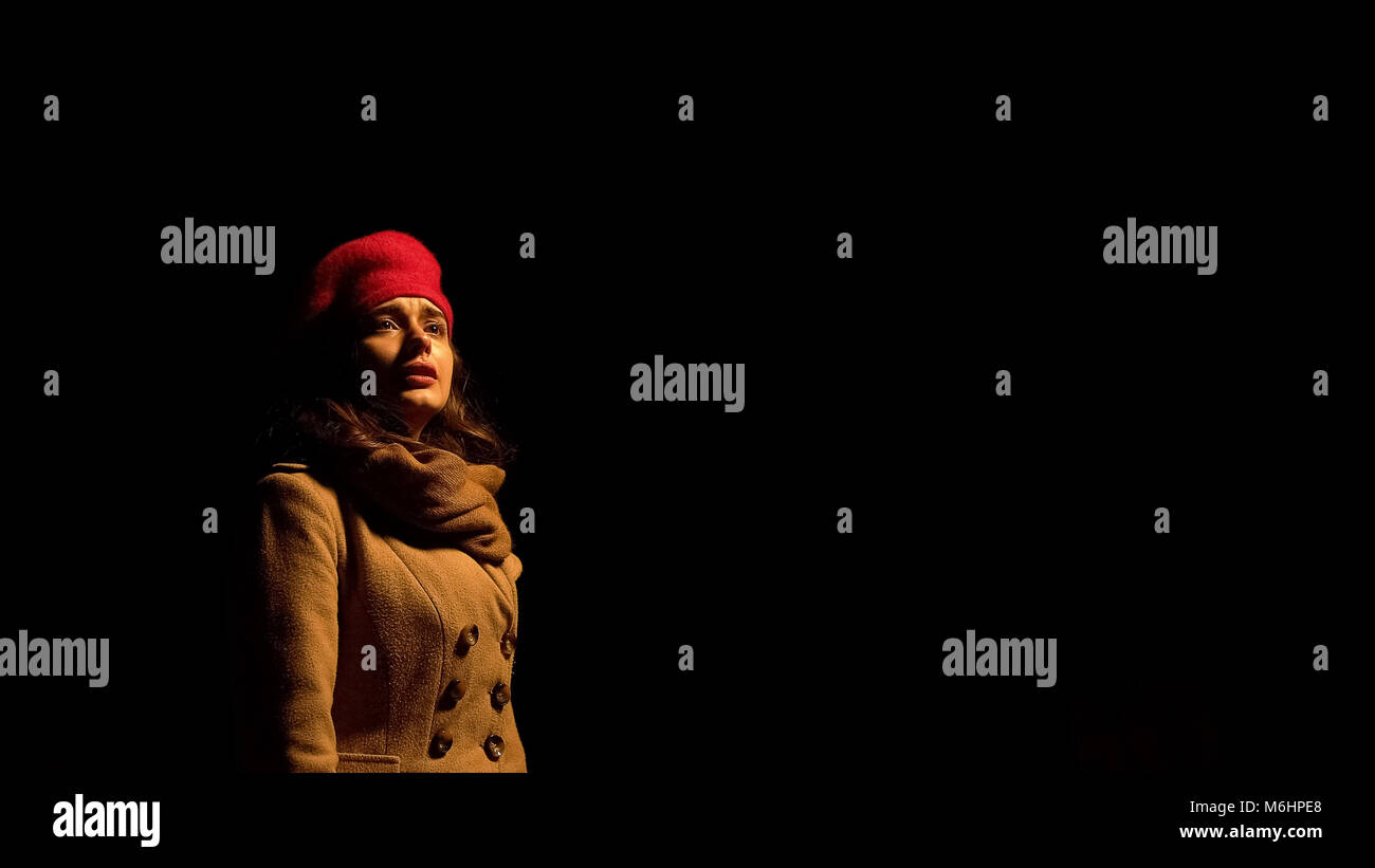 Lady standing alone at night, eyes with tears, just broke up with ...