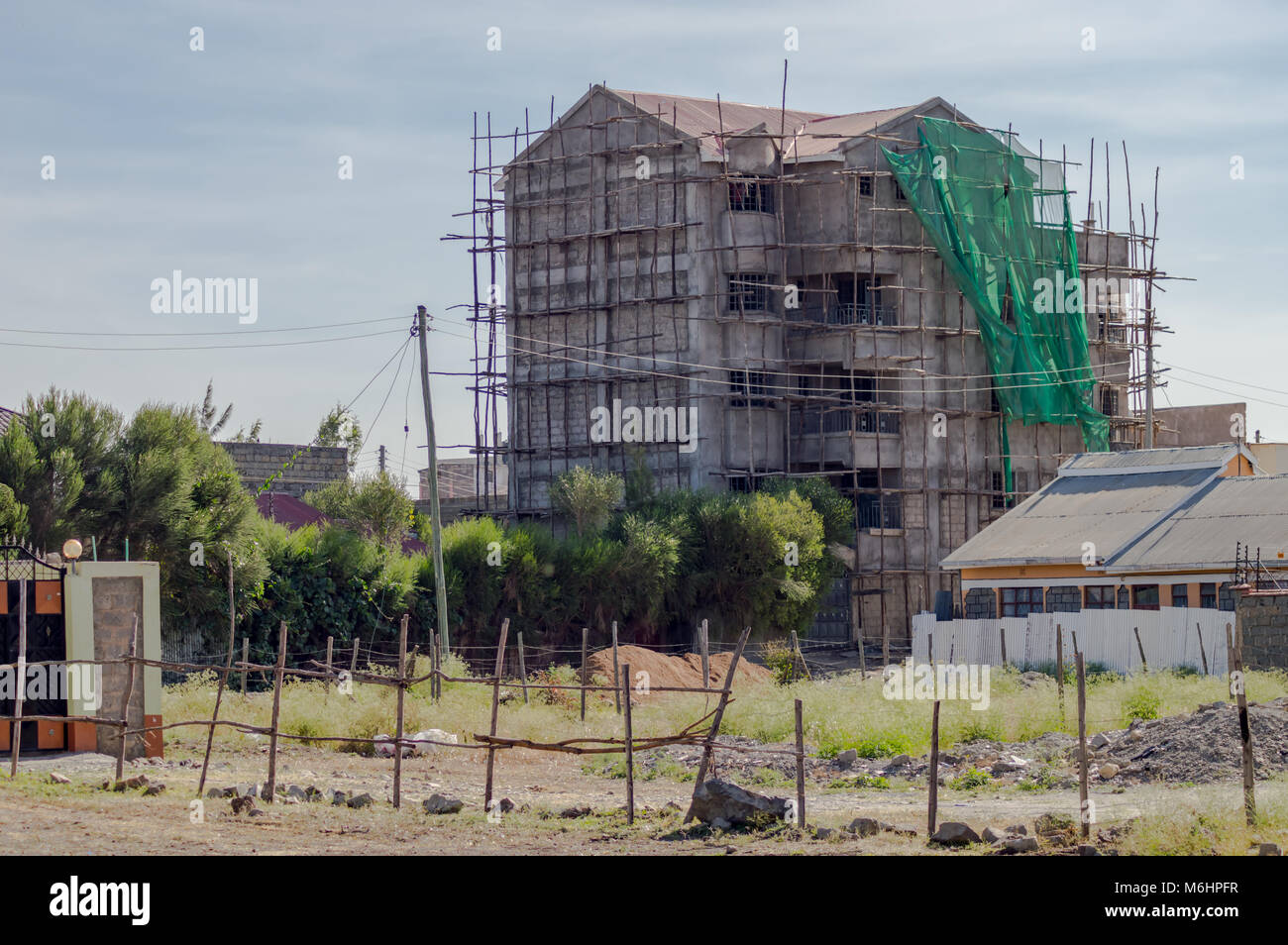 House under construction with a wooden scaffolding in the city of ...