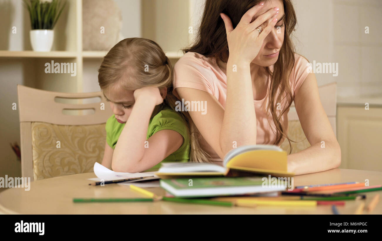 Sad daughter and mother having conflict doing lot of hard and boring ...
