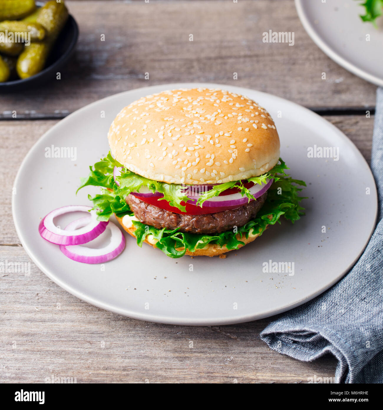 Burger on the plate hi-res stock photography and images - Alamy
