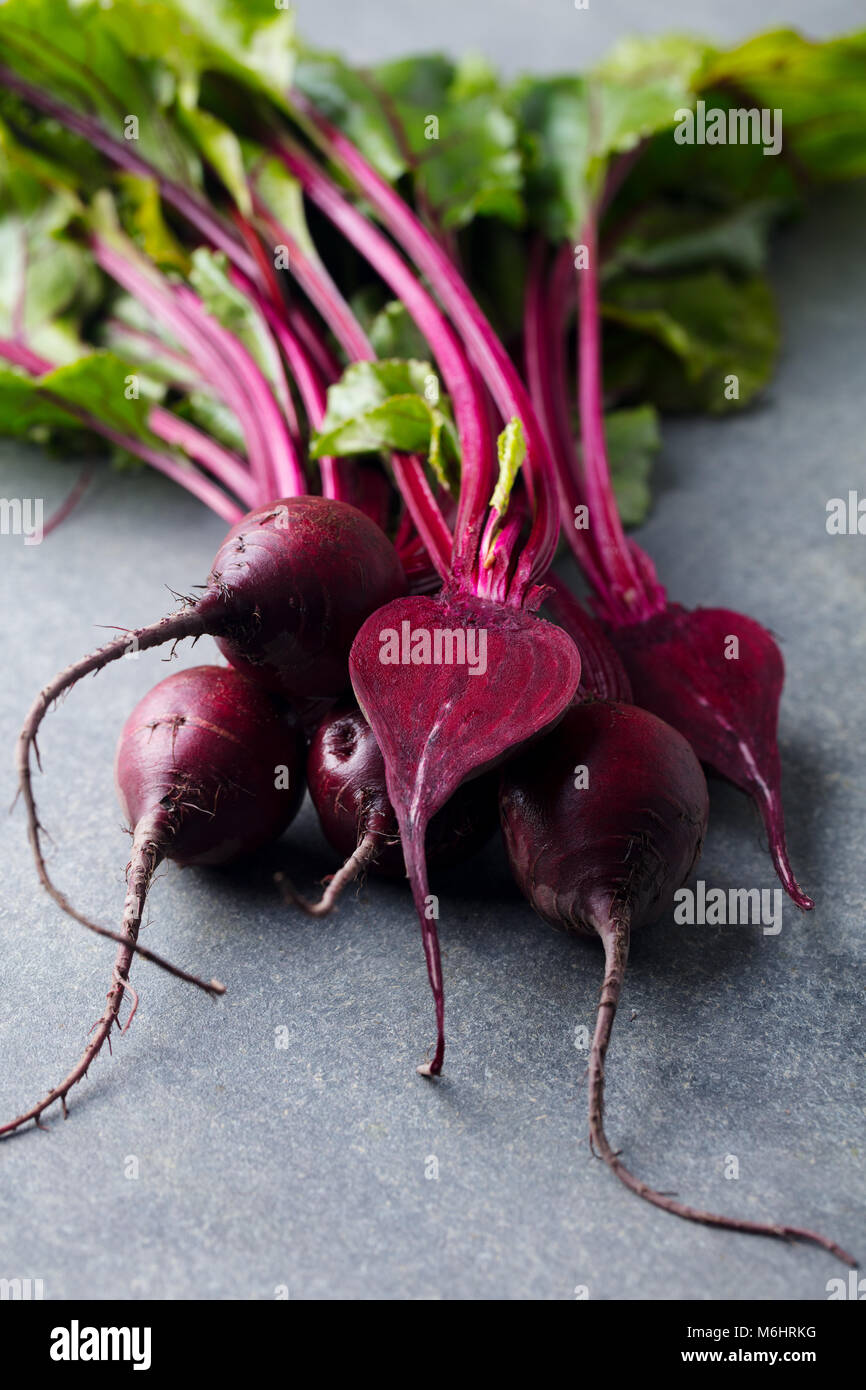 Beet, beetroot bunch on grey stone background Stock Photo - Alamy