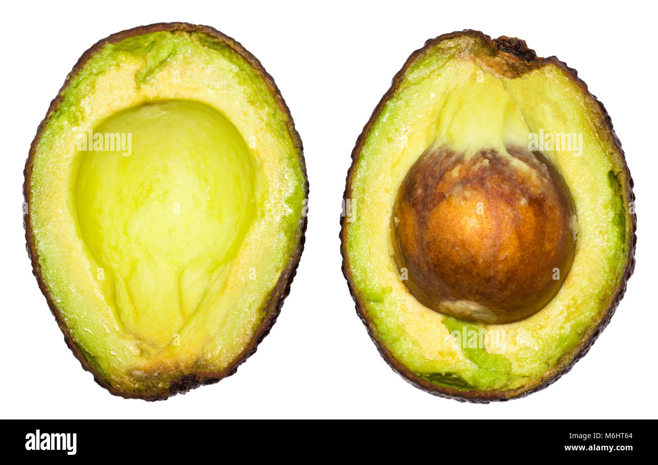 Two slices of avocado isolated on the white background. One slice with ...