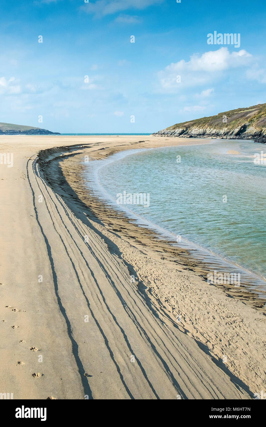The Gannel River flowing across Crantock beach in Newquay Cornwall ...