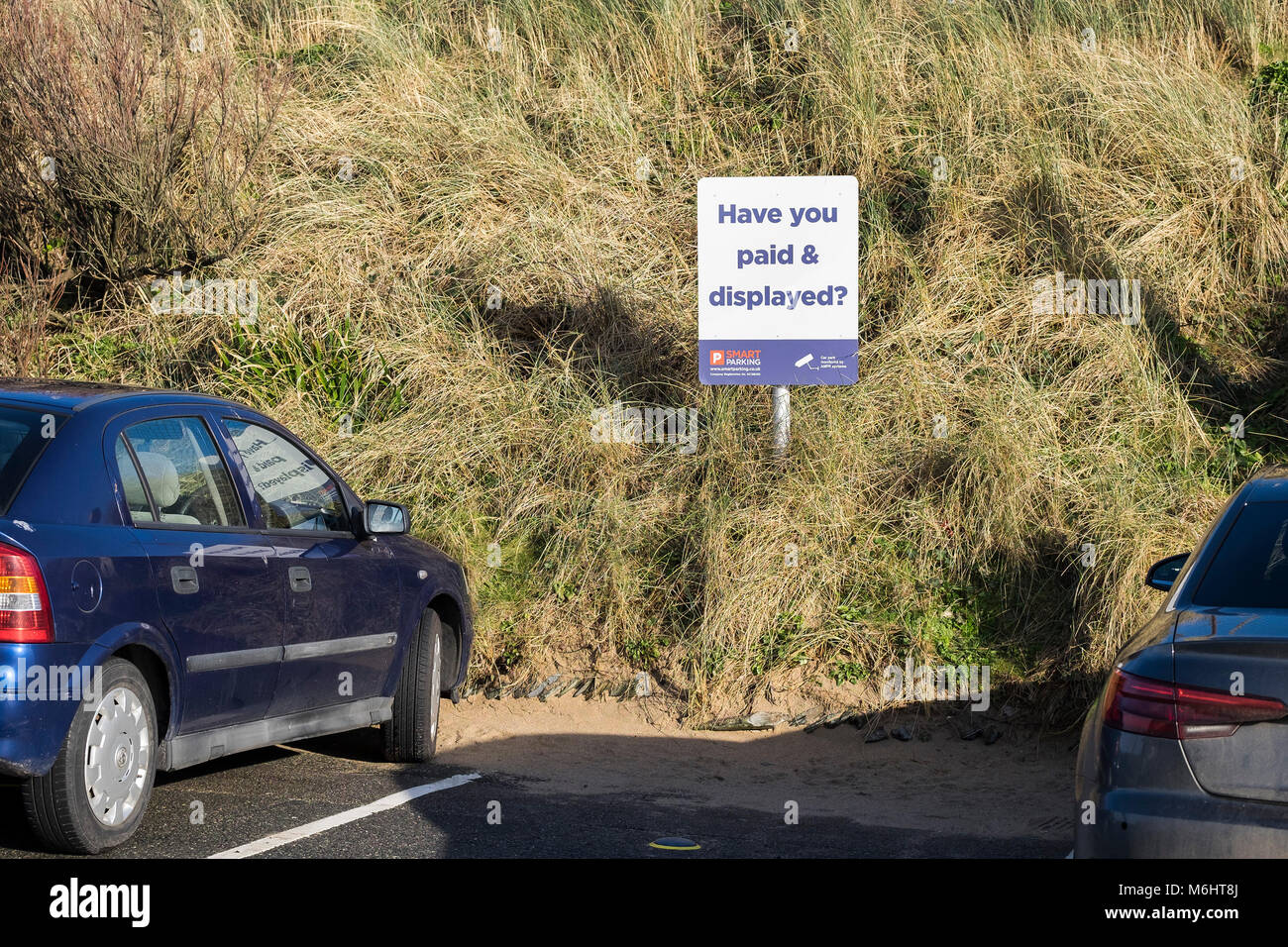 A parking sign owned by Smart Parking in Fistral Beach car park in ...