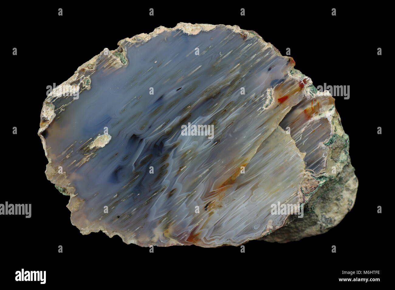 Micro-stalactite agate (in reverse position). Multicolored silica bands ...