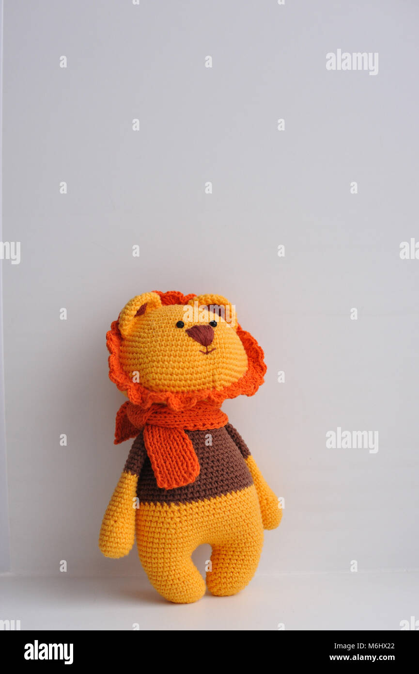Lion toy knitted in the technique of knitting amigurumi Stock Photo - Alamy