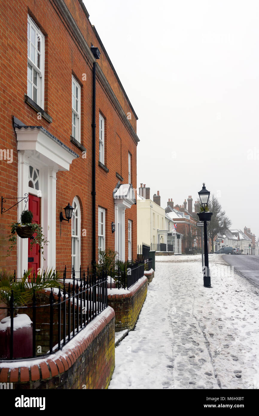 Odiham High Street in Hampshire, UK on a cold, snowy winter's day Stock ...