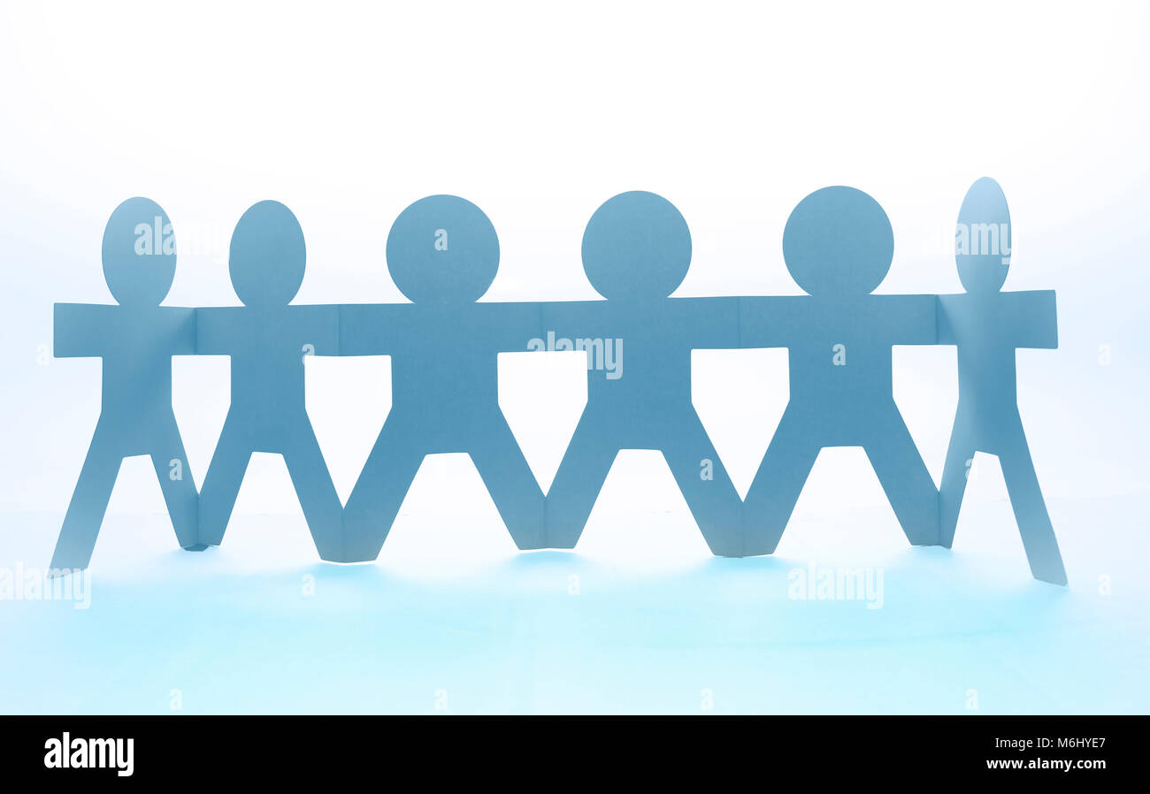 Team of paper chain people Stock Photo - Alamy