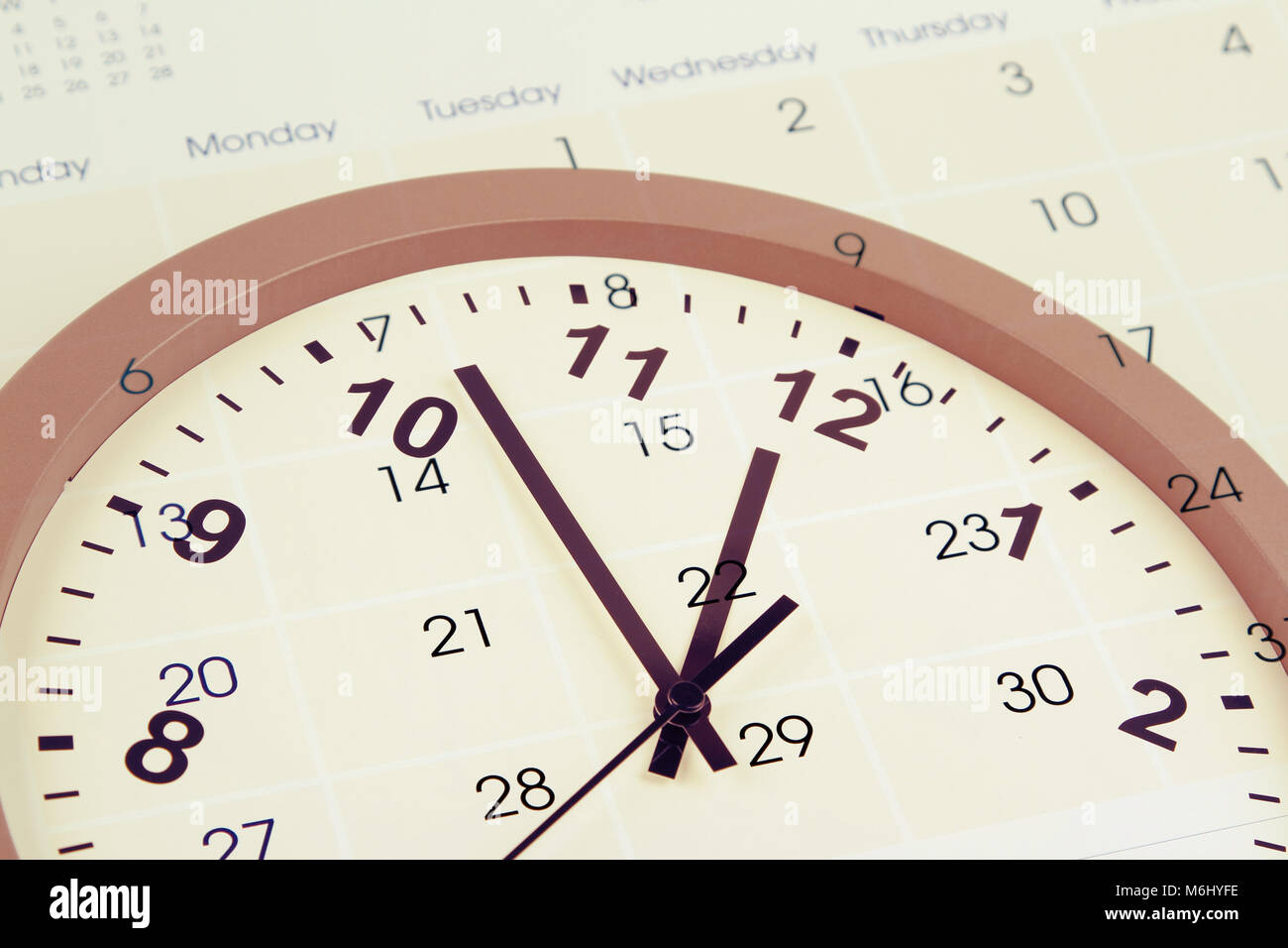 Clock face and calendar composite Stock Photo - Alamy