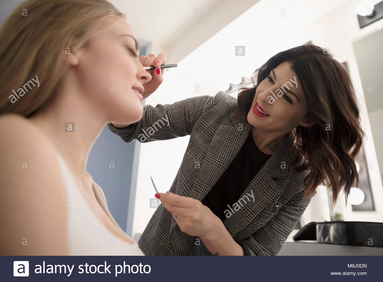 Female model smiling makeup hi-res stock photography and images - Alamy