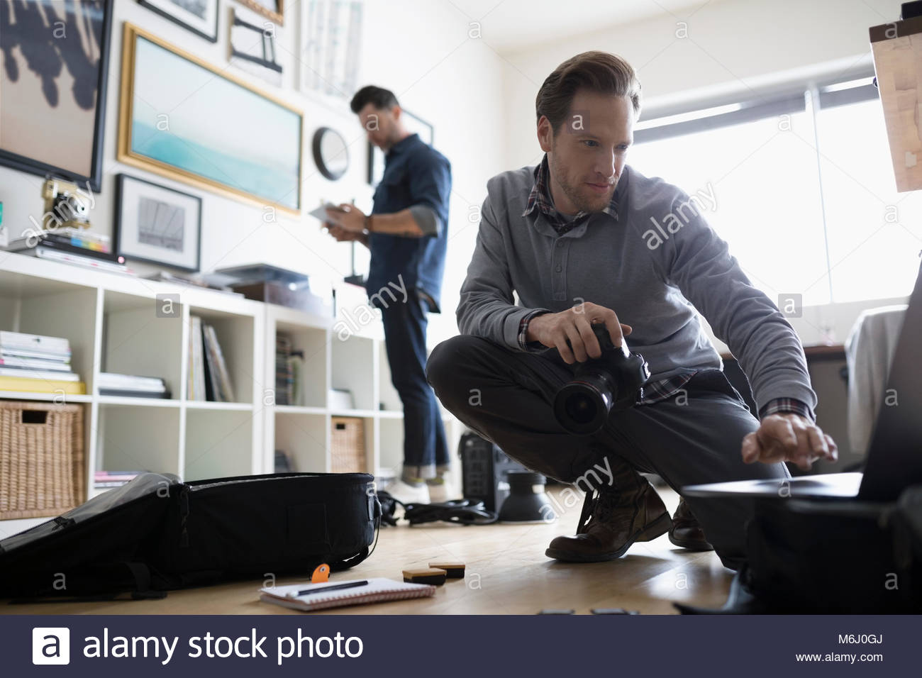 Sitting on camera of a photographer hi-res stock photography and images ...