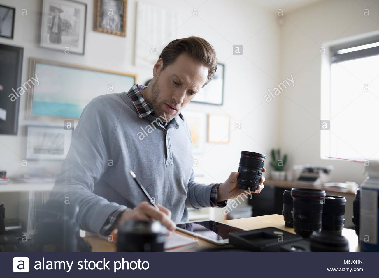 Checking camera hi-res stock photography and images - Alamy
