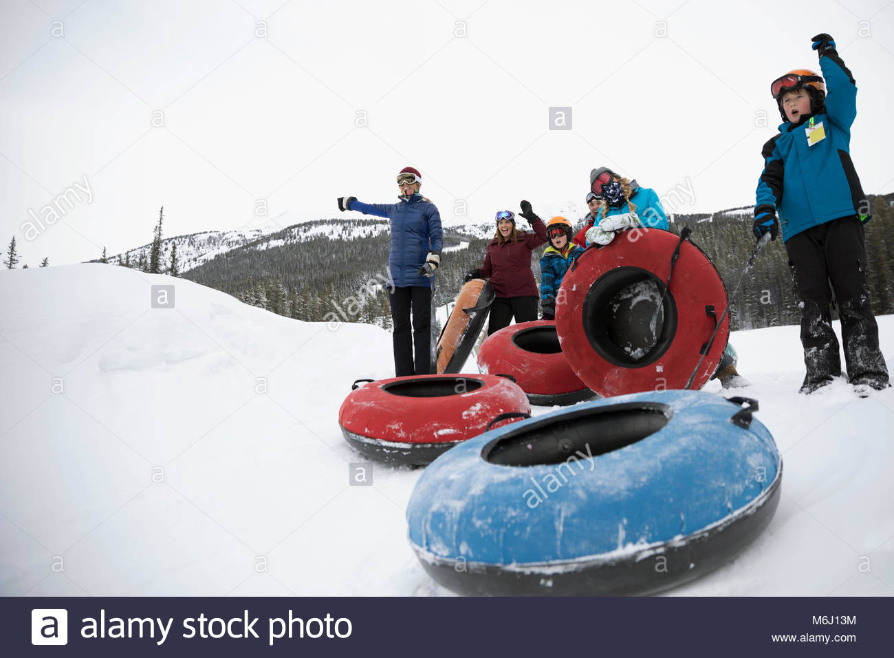 Women snow tubing hi-res stock photography and images - Alamy