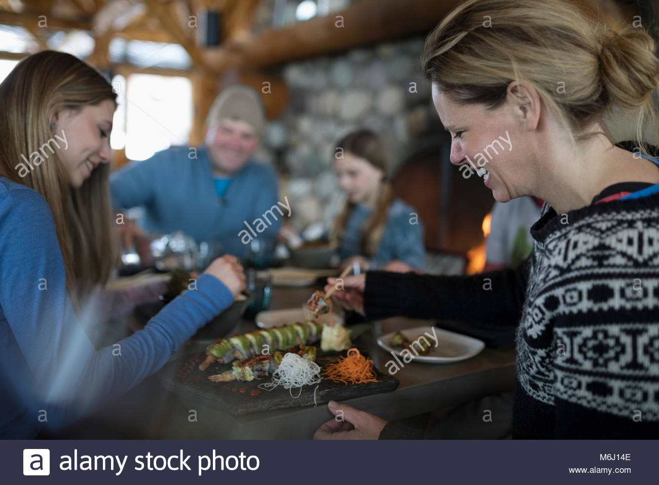 Family eating together restaurant hi-res stock photography and images ...
