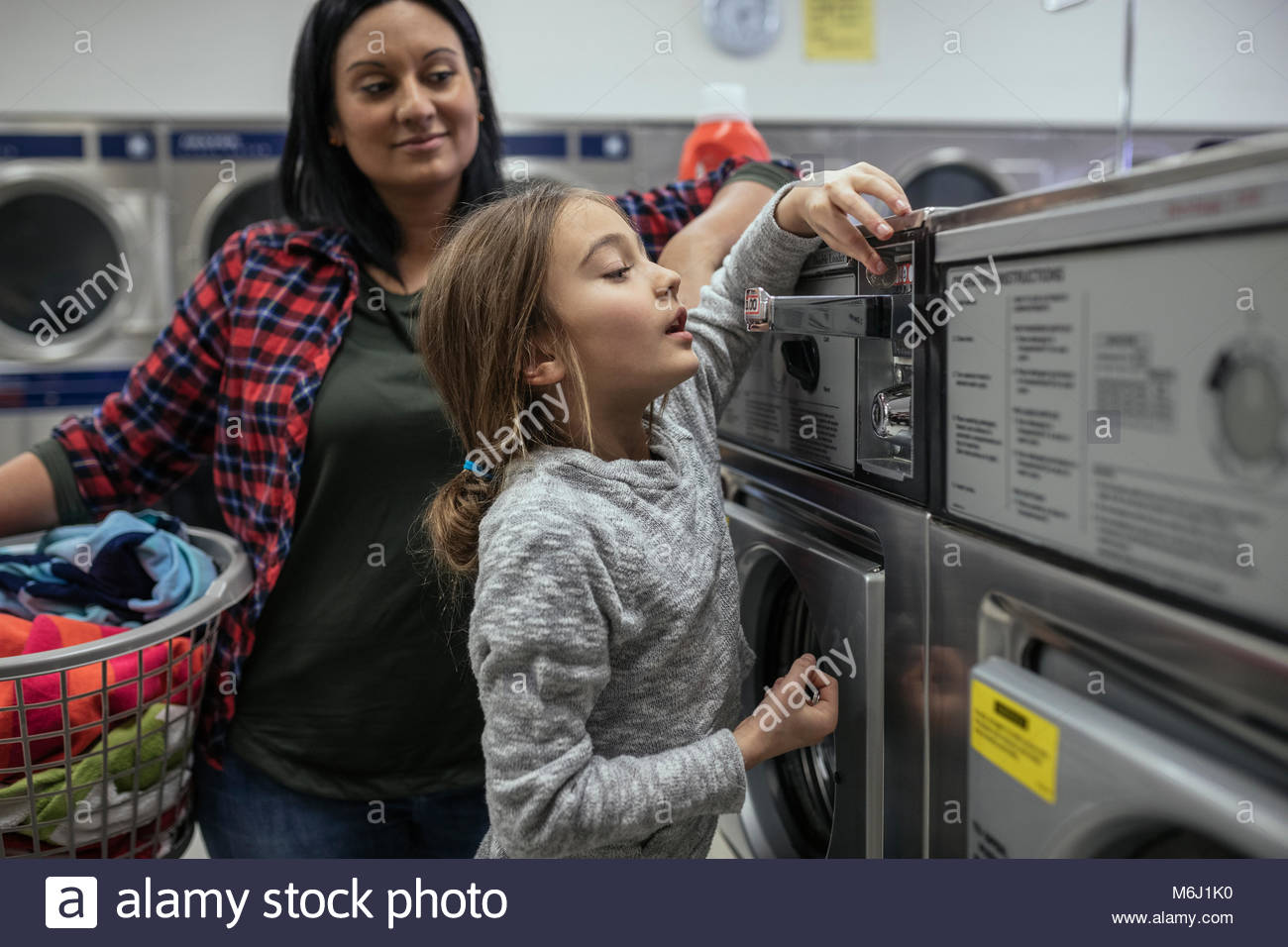 Insert a coin hi-res stock photography and images - Alamy