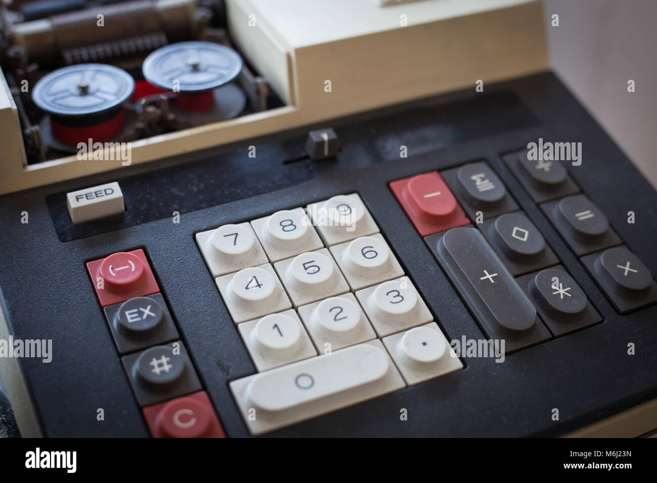 Vintage of calculator device on work table Stock Photo - Alamy