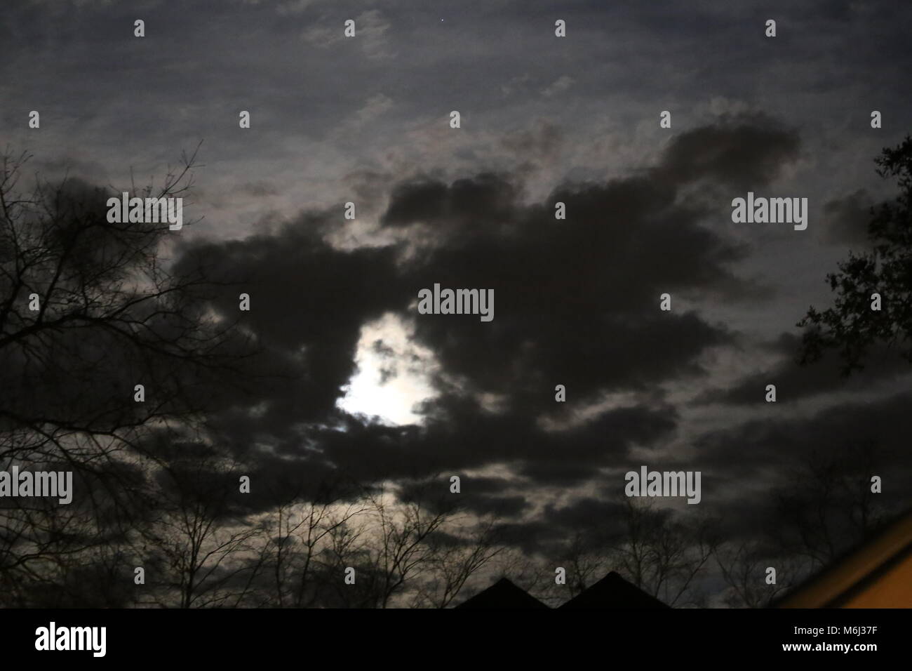 Cloudy moonlit night sky hi-res stock photography and images - Alamy