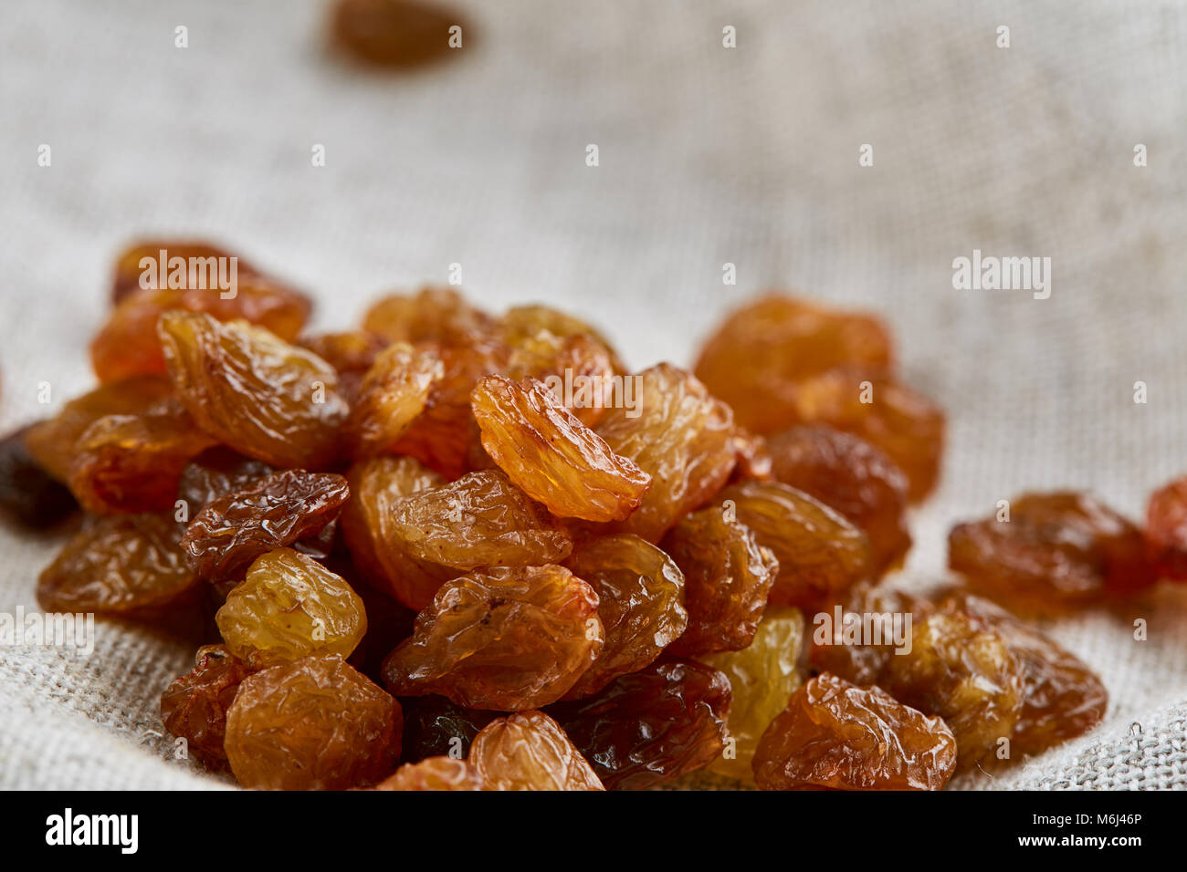 Dried raisins isolated on white background. Close-up, shellow depth of ...