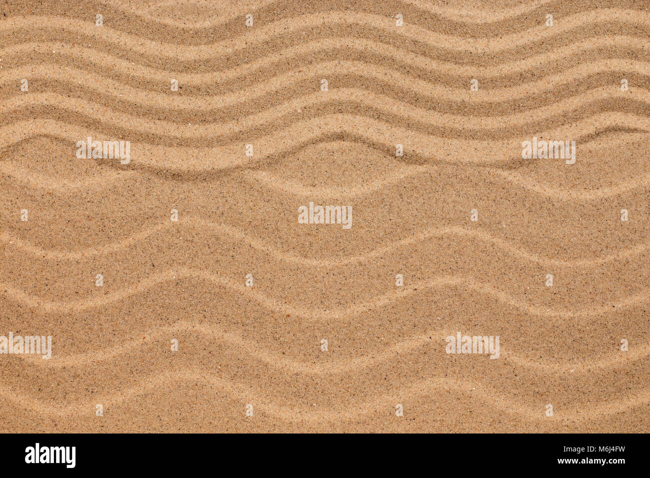 Zigzag and sand dunes, sand texture, background. View from above Stock ...