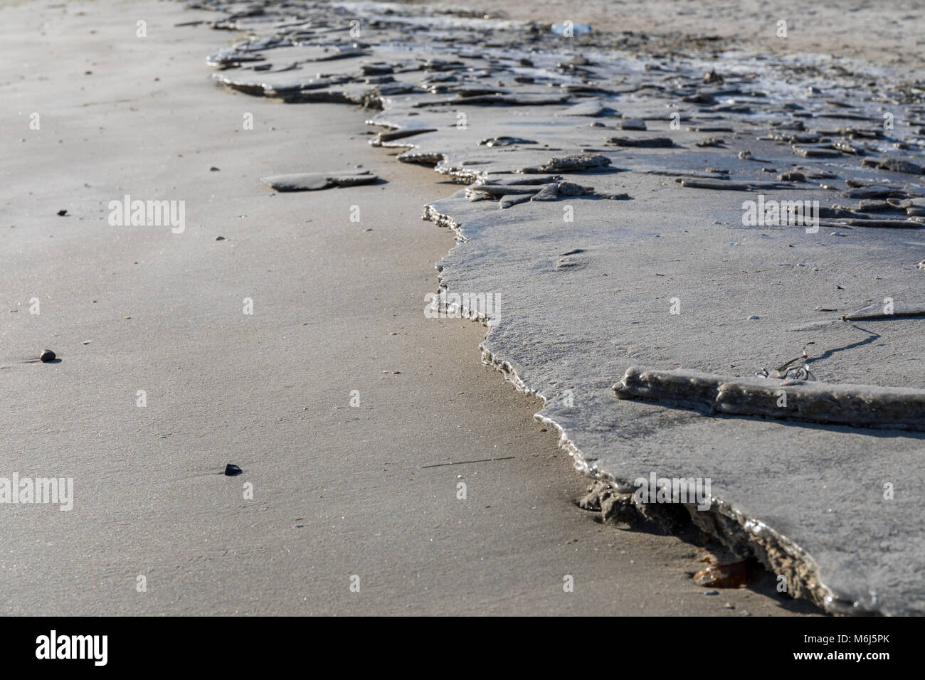 Frozen sand; Saeby Beach, Denmark Stock Photo - Alamy