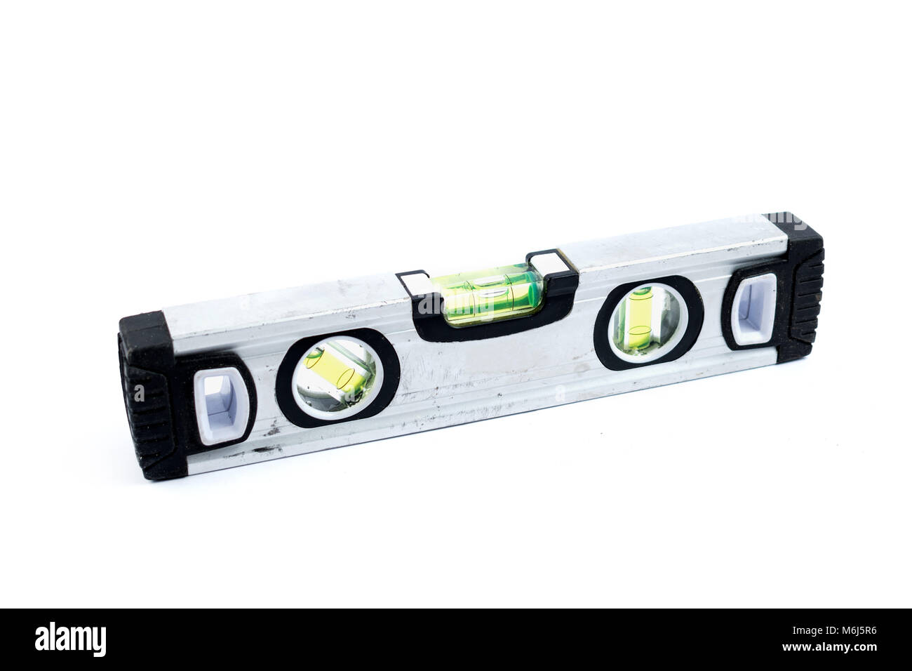 Silver spirit level isolated on white background. Construction tool ...