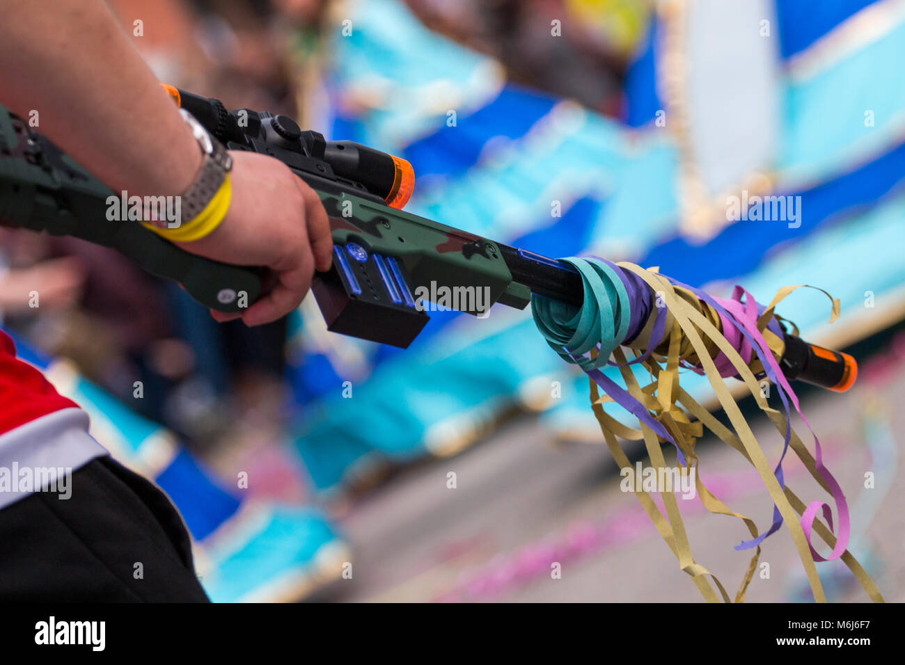 Close up view of a fake toy gun in Carnival parade Stock Photo - Alamy