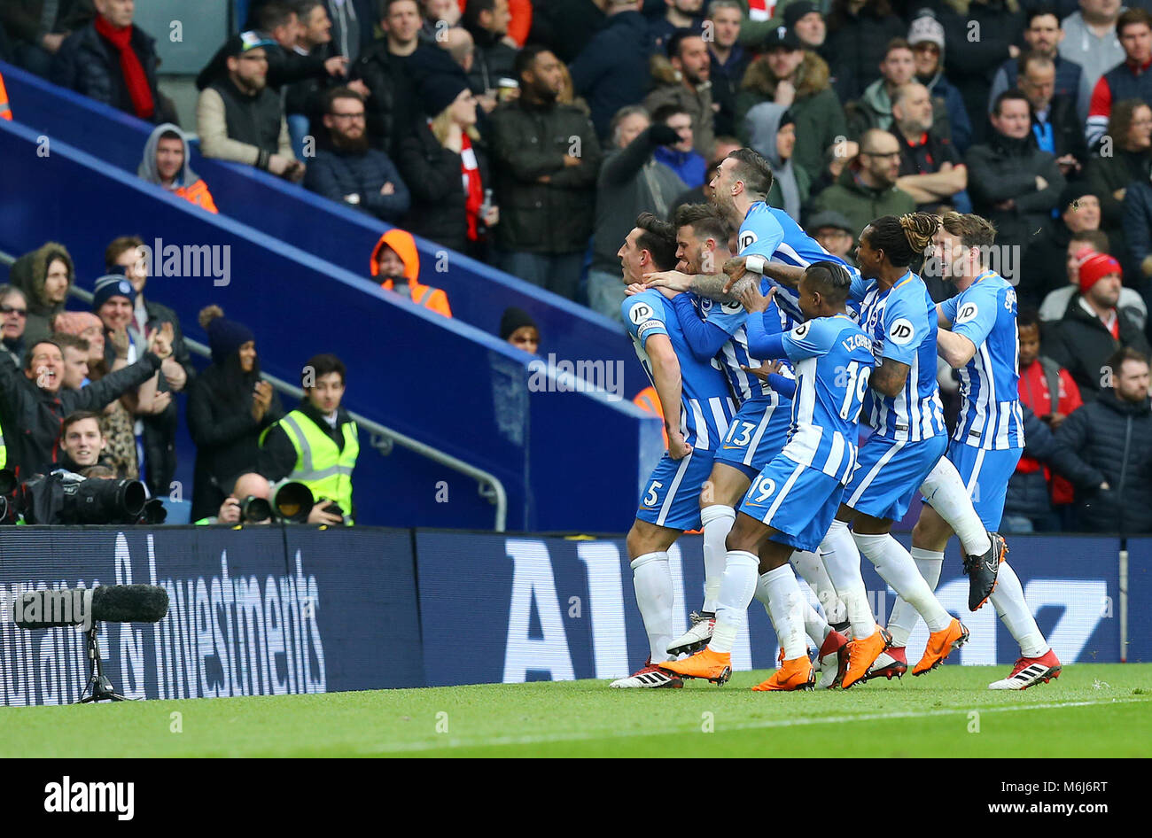 Brighton & Hove Albion's Lewis Dunk (left) celebrates scoring his side ...