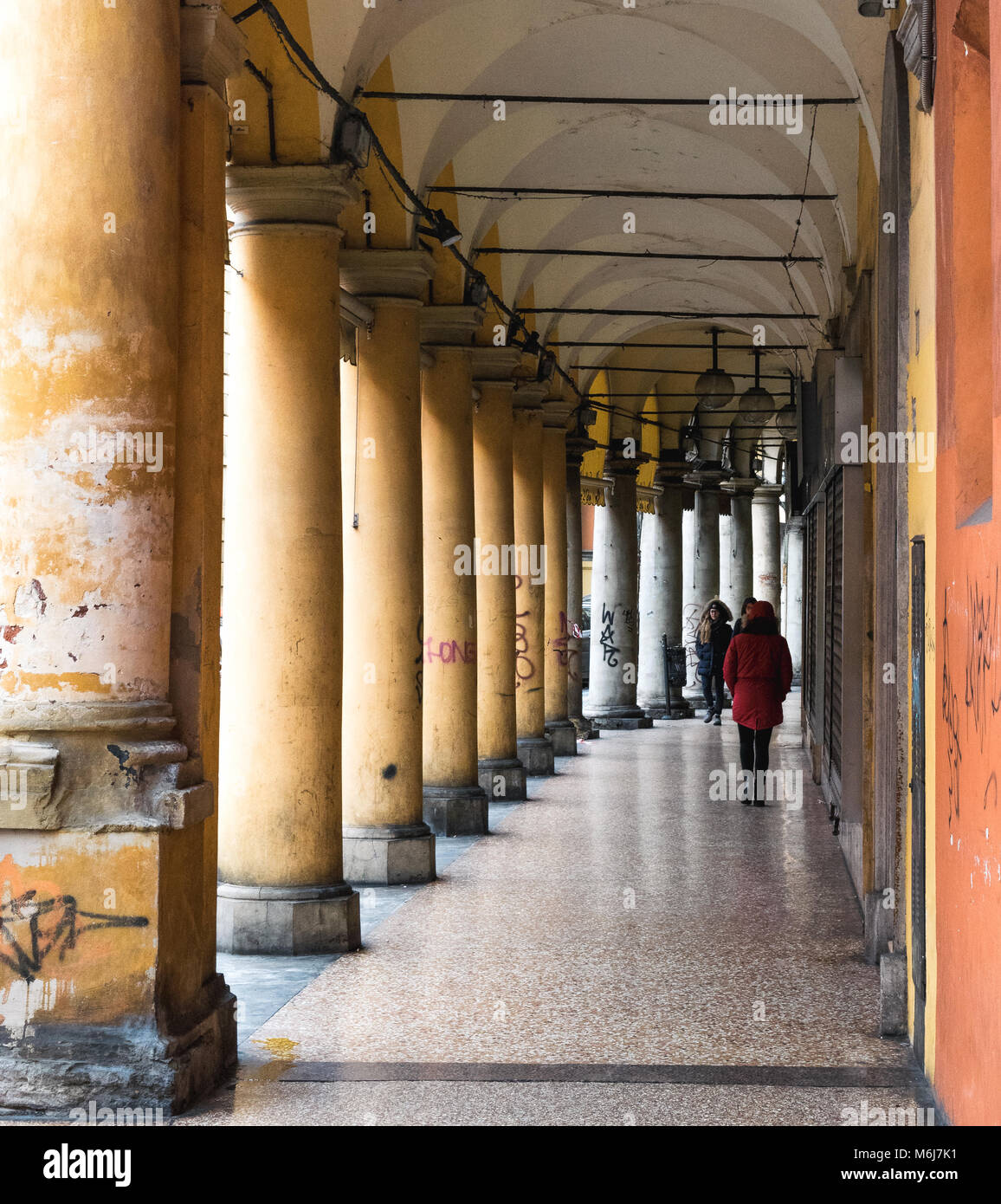BOLOGNA, ITALY - 17 FEBRUARY, 2016: People Walking through a Portico ...