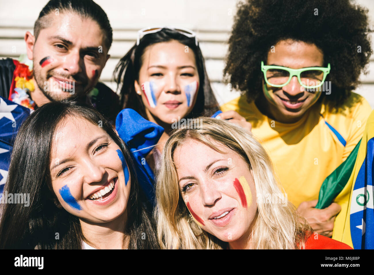 Group of mixed football fans Stock Photo - Alamy
