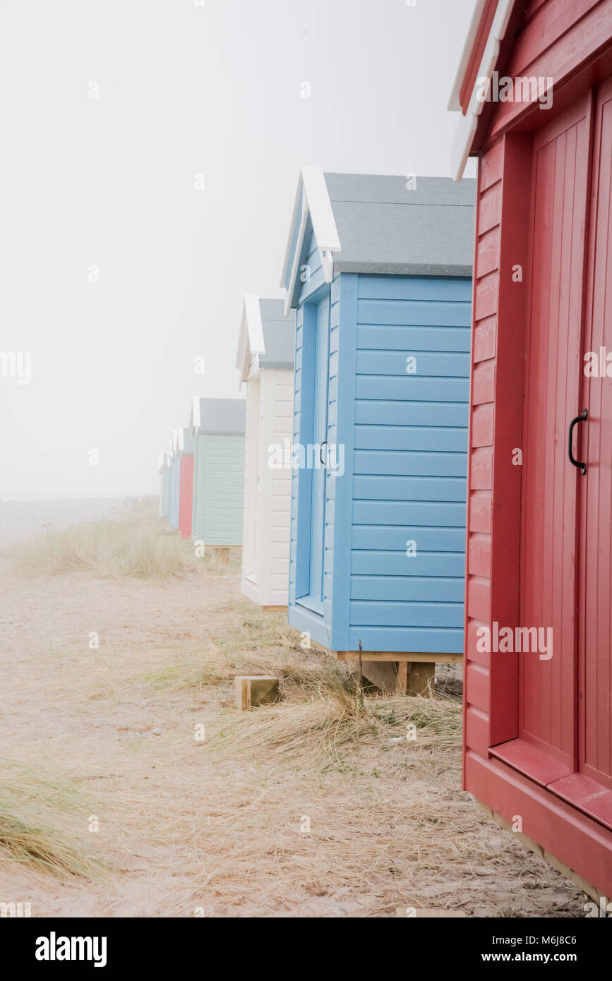 Beautiful colourful beach huts hi-res stock photography and images - Alamy