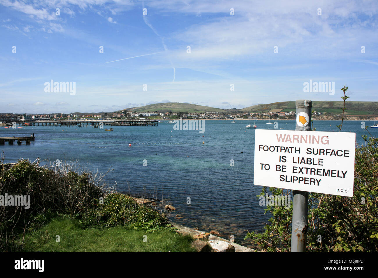 Warning sign near National Coastwatch lookout tower at Peveril Point on ...