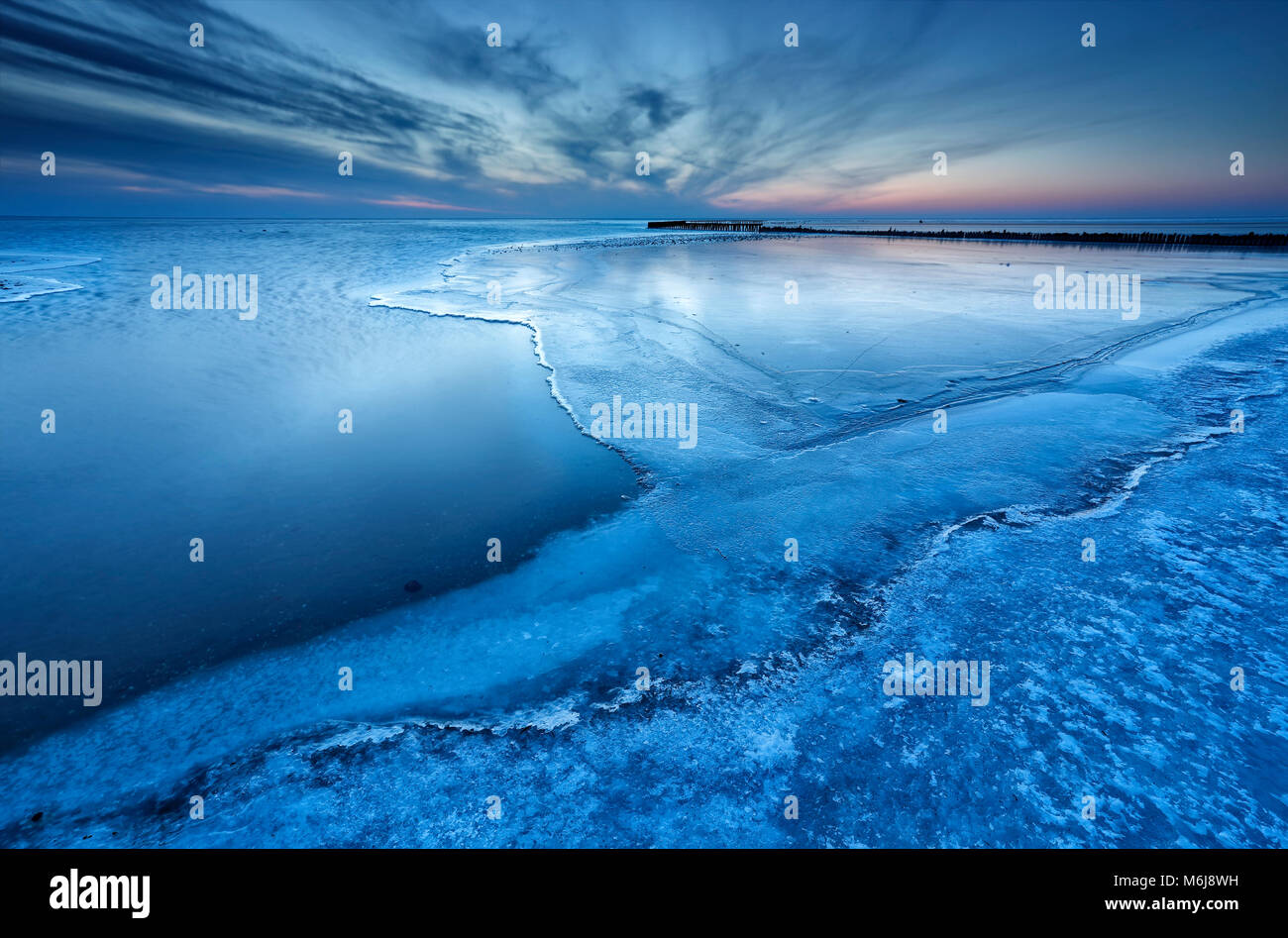 half frozen big lake in dusk, IJsselmeer, Netherlands Stock Photo - Alamy