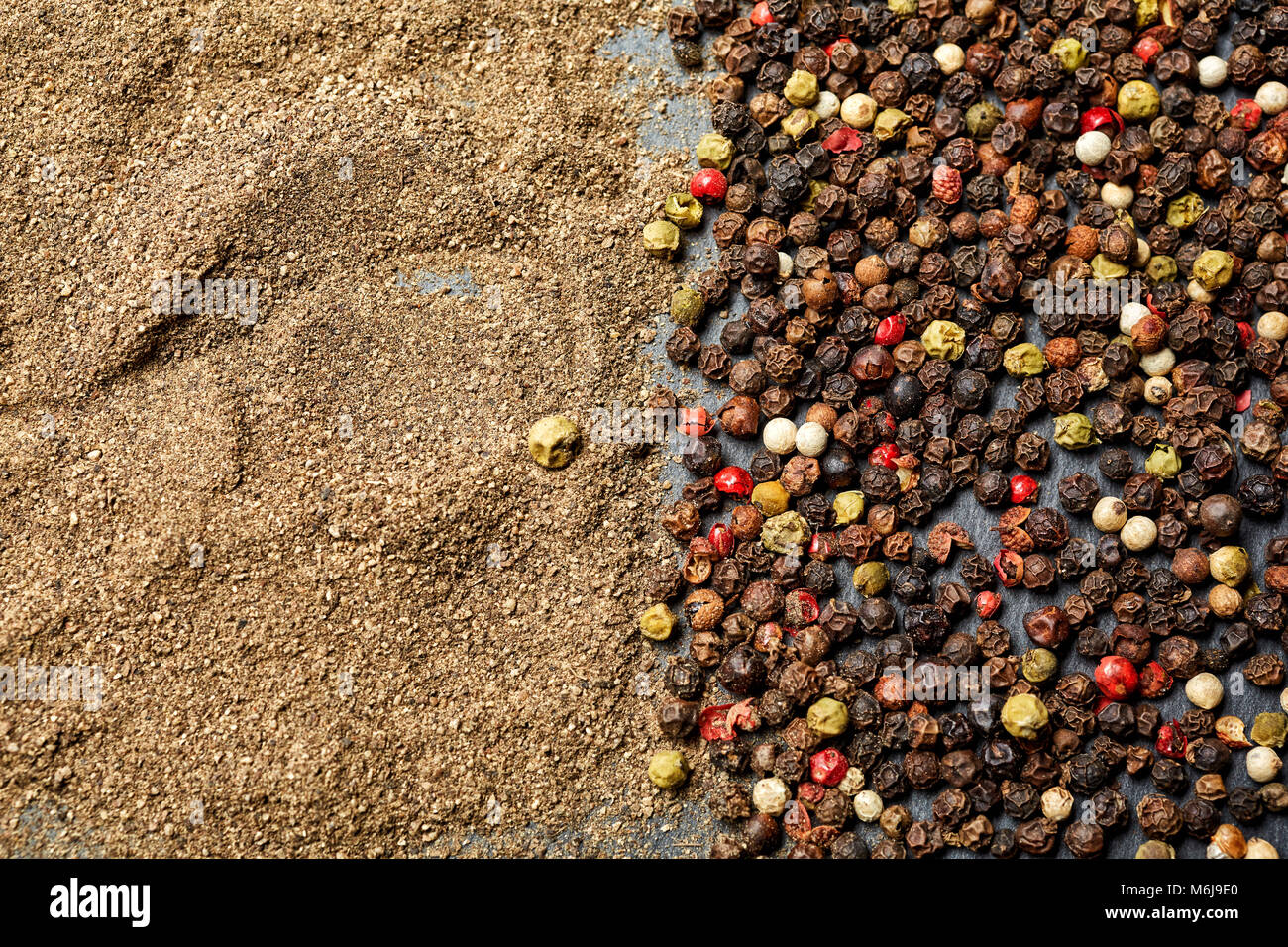 Different types of pepper. Mix of grind black pepper and allspice seeds ...