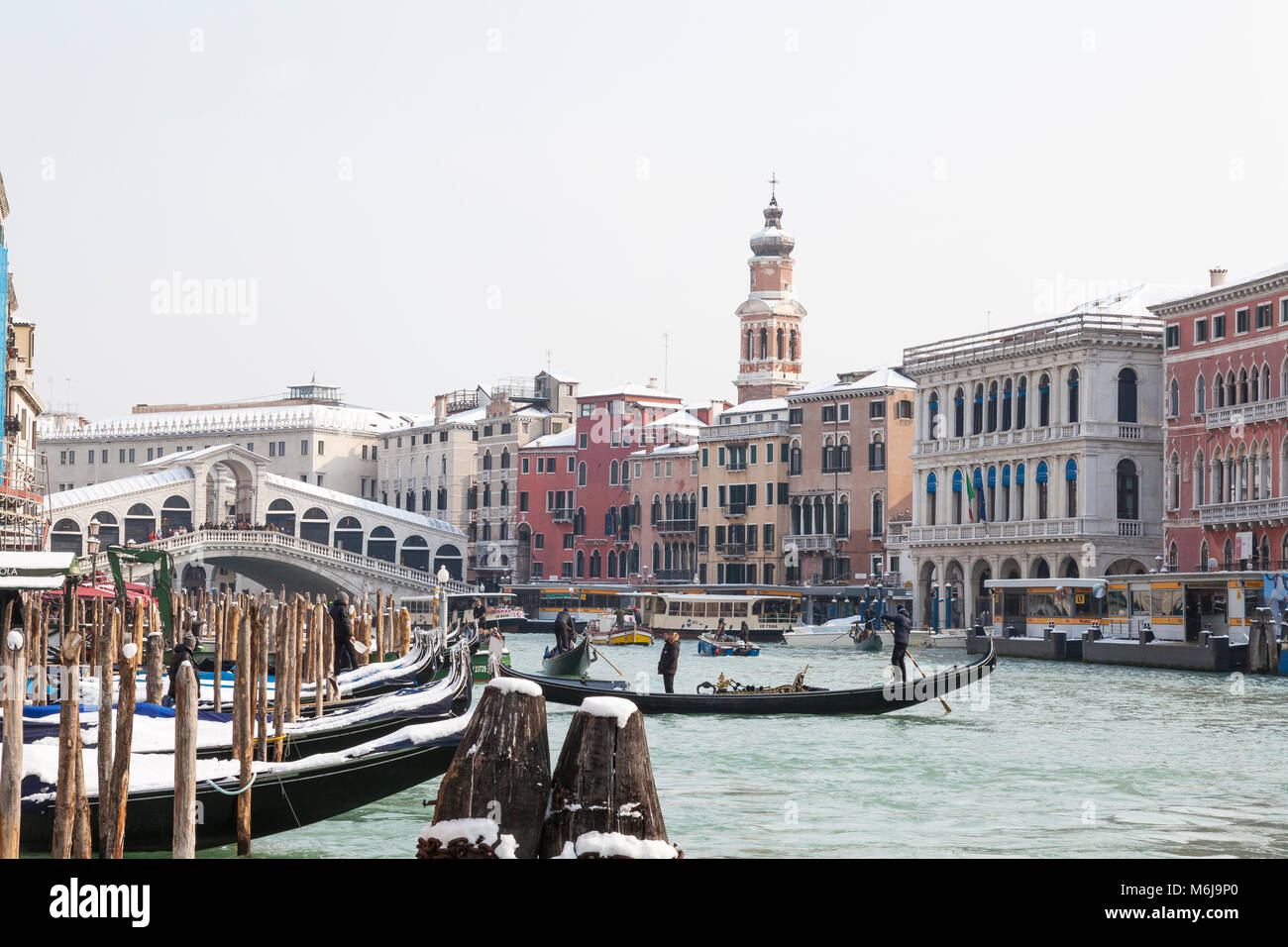 Snow covered Rialto Bridge and Grand Canal, Venice, Veneto, Italy with ...