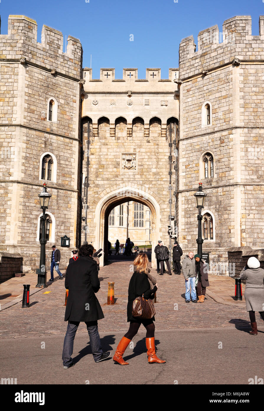 The Entrance to Windsor Castle in England with sightseers walking by ...