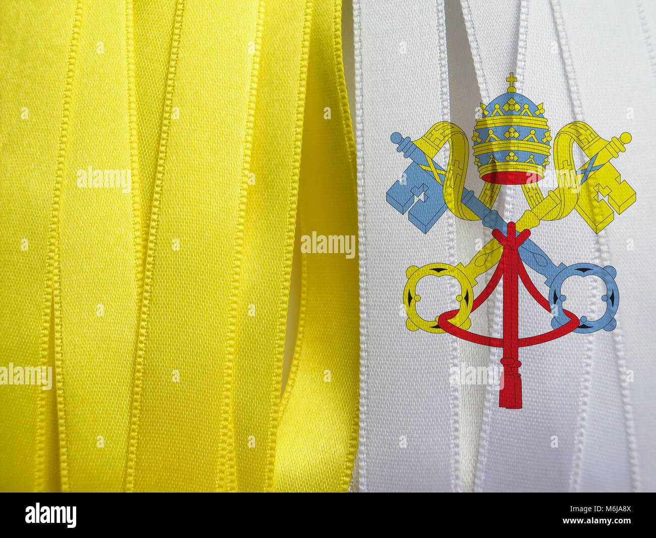 Vatican flag or banner made with Yellow and white ribbons Stock Photo ...