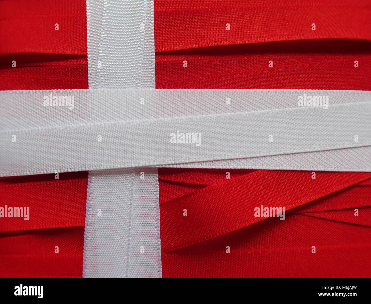 Denmark flag or banner made with red and white ribbons Stock Photo - Alamy