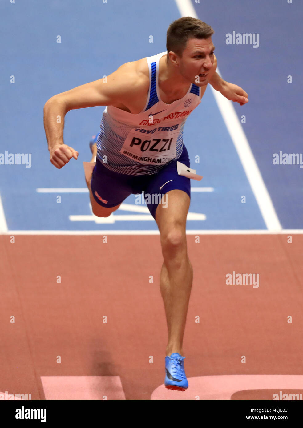 Great Britain's Andrew Pozzi stretches to win the Men's 60m final ...