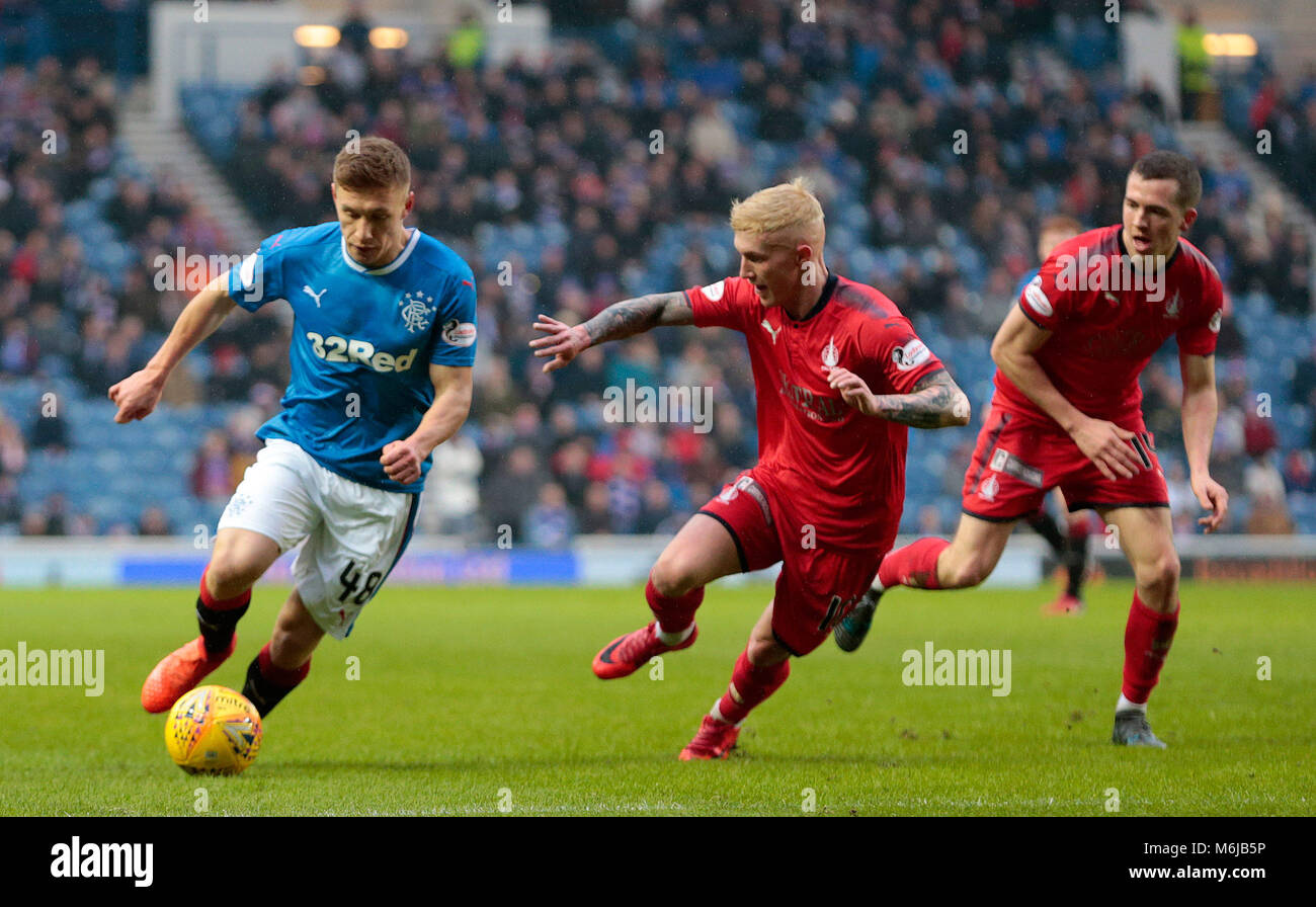 Rangers' Greg Docherty (left) competes with Falkirk's Craig Sibbald ...