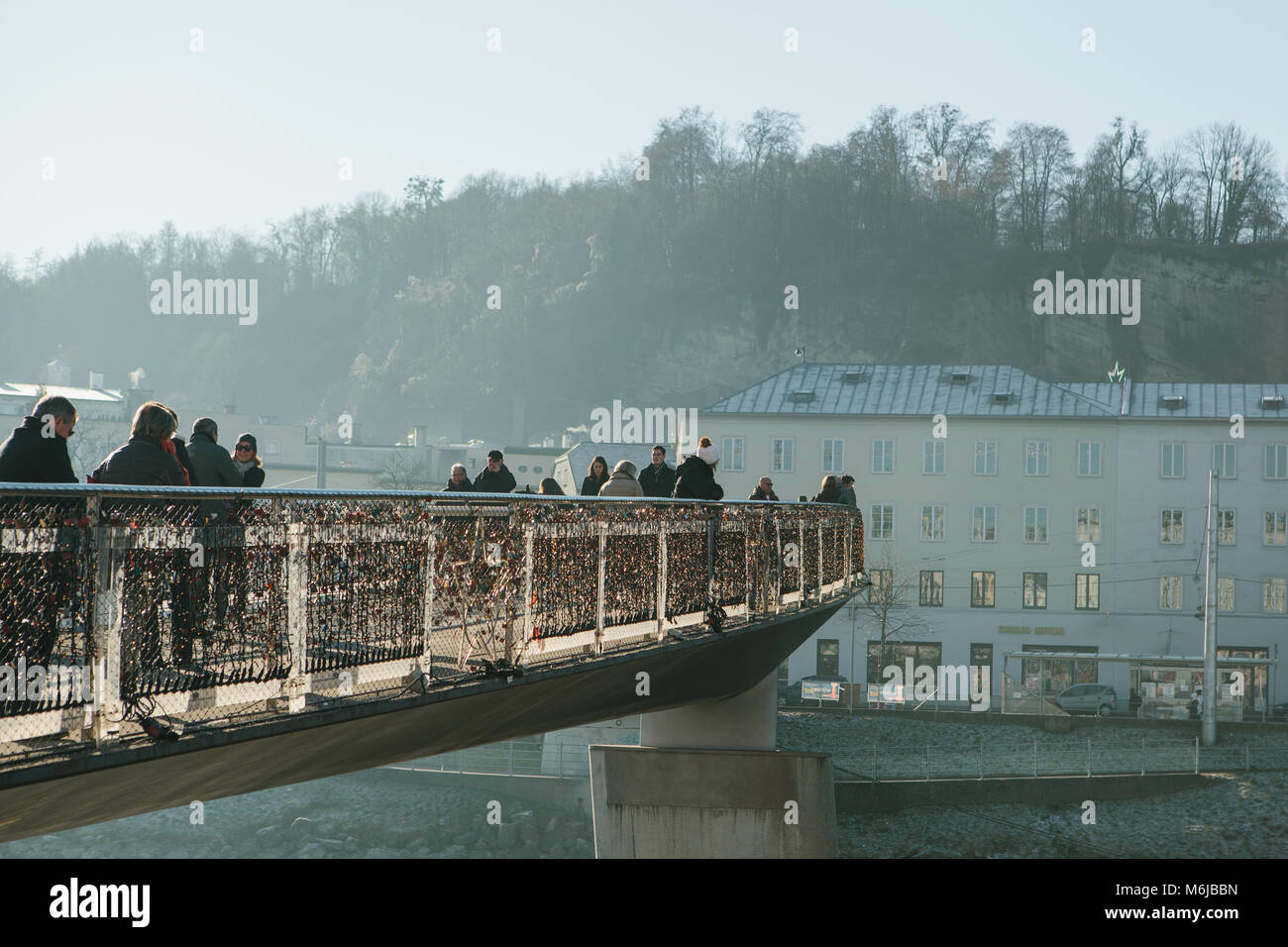 Austria, Salzburg, January 1, 2017: Mozart's pedestrian bridge connects ...