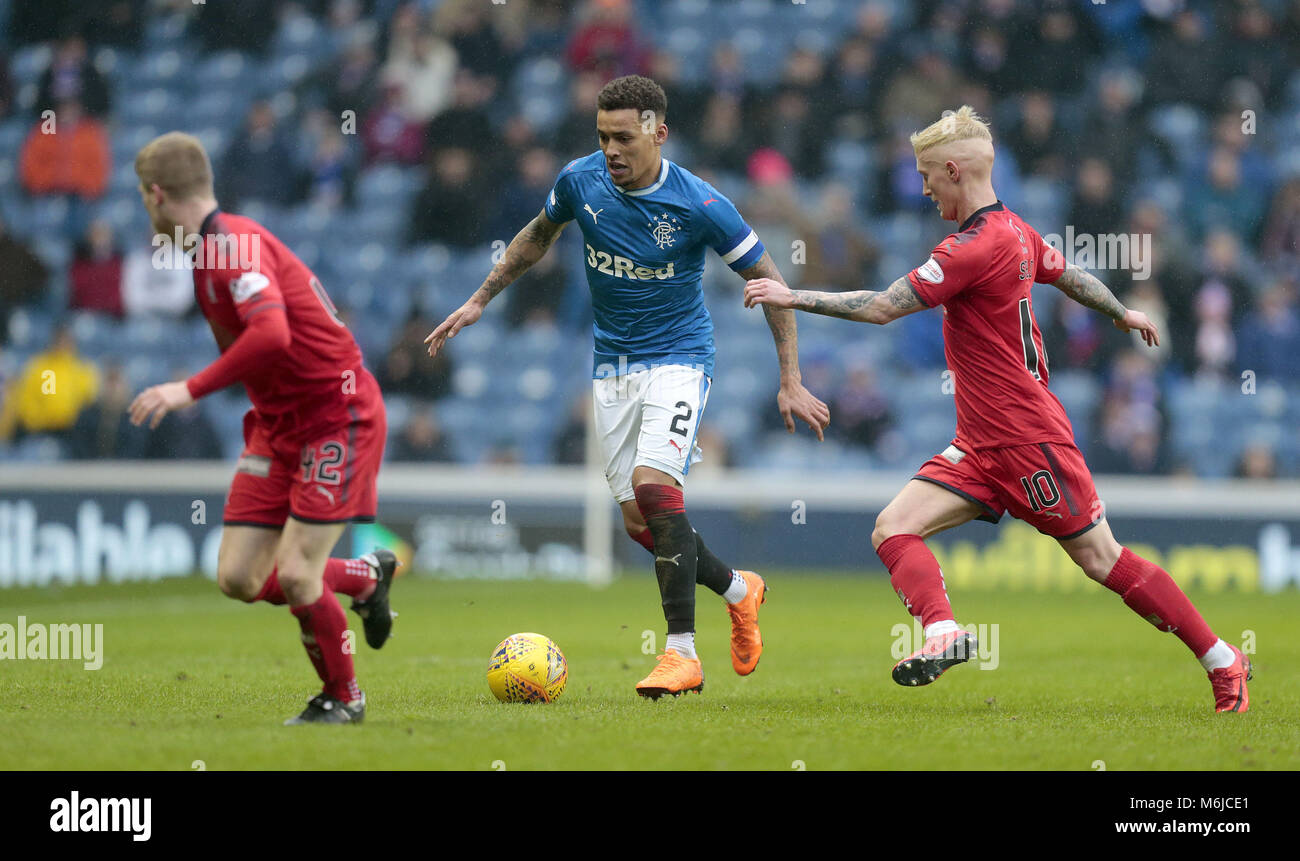 Rangers' James Tavernier (second right) competes with Falkirk's Craig ...