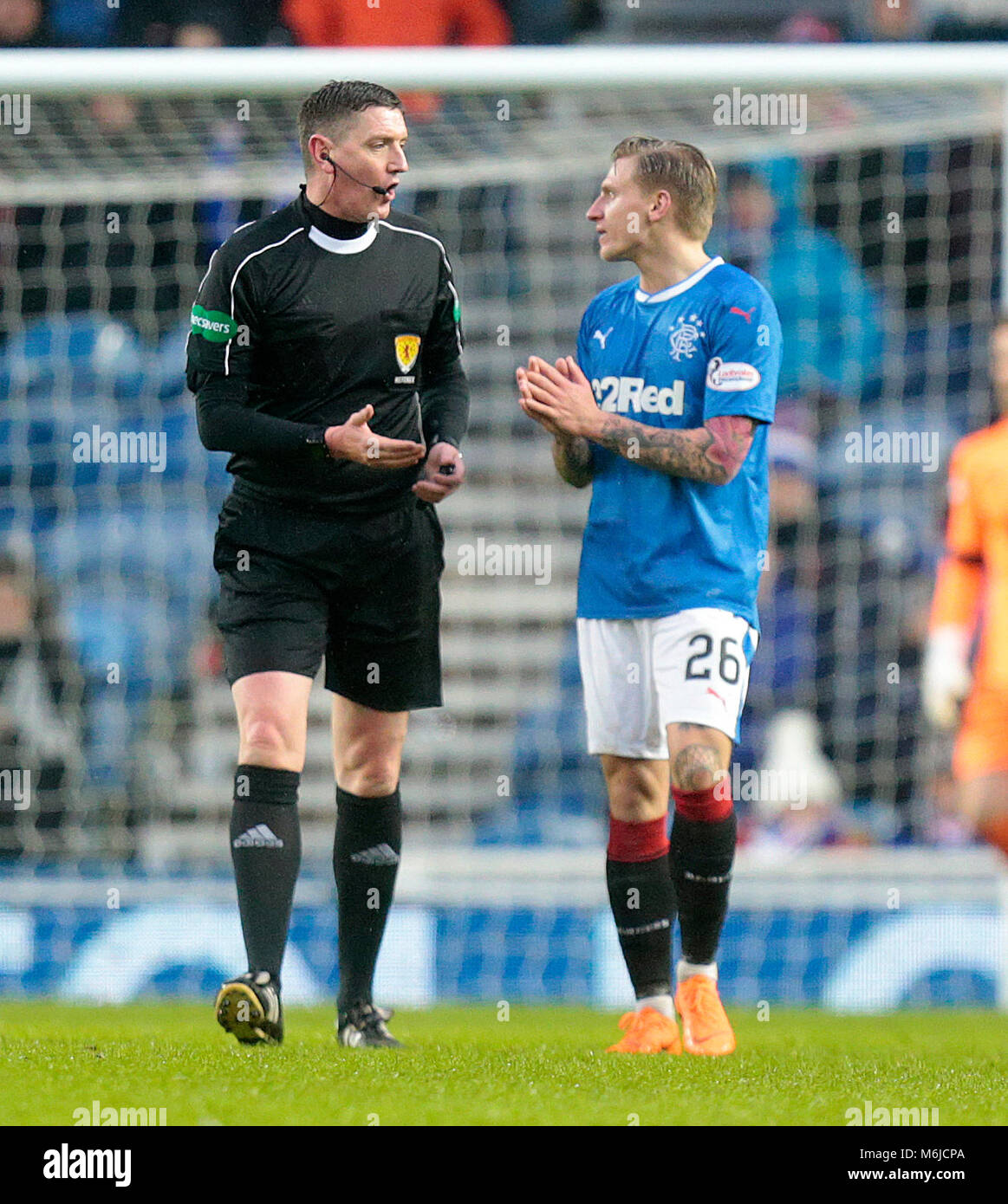 Rangers' Jason Cummings (right) speaks with match referee Craig Thomson ...